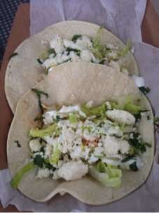 baskets of chicken tacos with crumbled cotija cheese - Latin Business Today